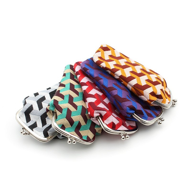 Geometric pattern clasp purse
